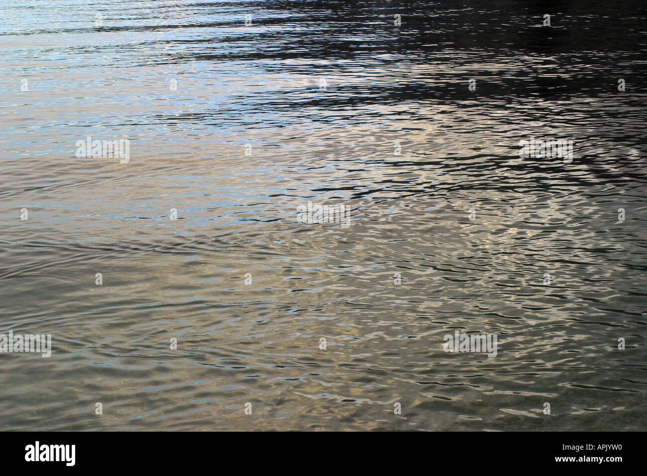 Sun reflecting on Water surface Stock Photo - Alamy