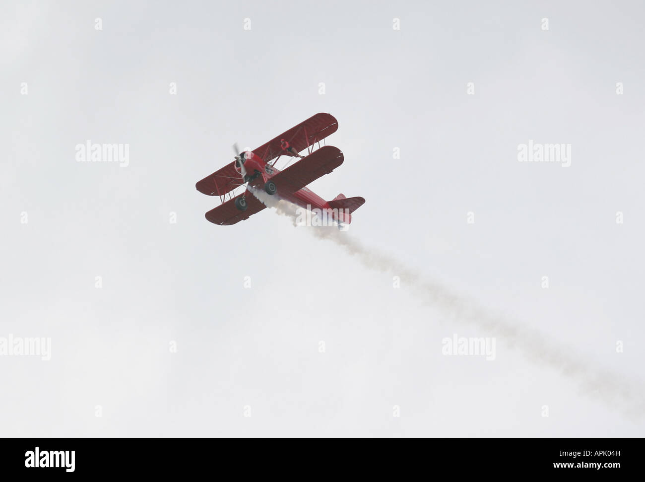 Red biplane in flight hi-res stock photography and images - Alamy