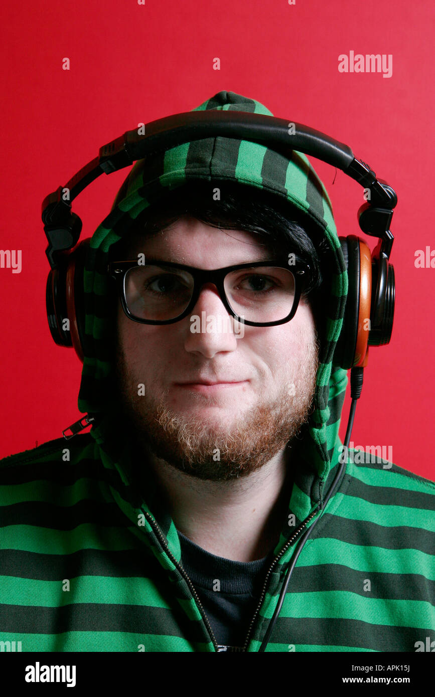 A studio shot of someone with headphones Stock Photo - Alamy