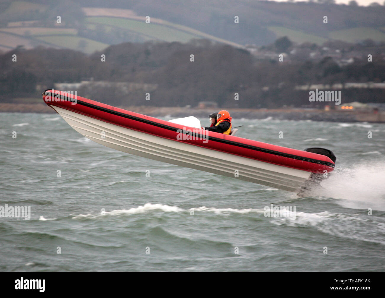 Phantom Rib Powerboat Racing at Exmouth England through choppy water ...