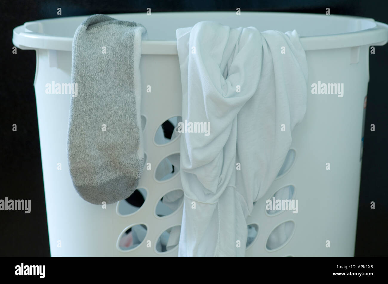 laundry basket with dirty clothes Stock Photo - Alamy