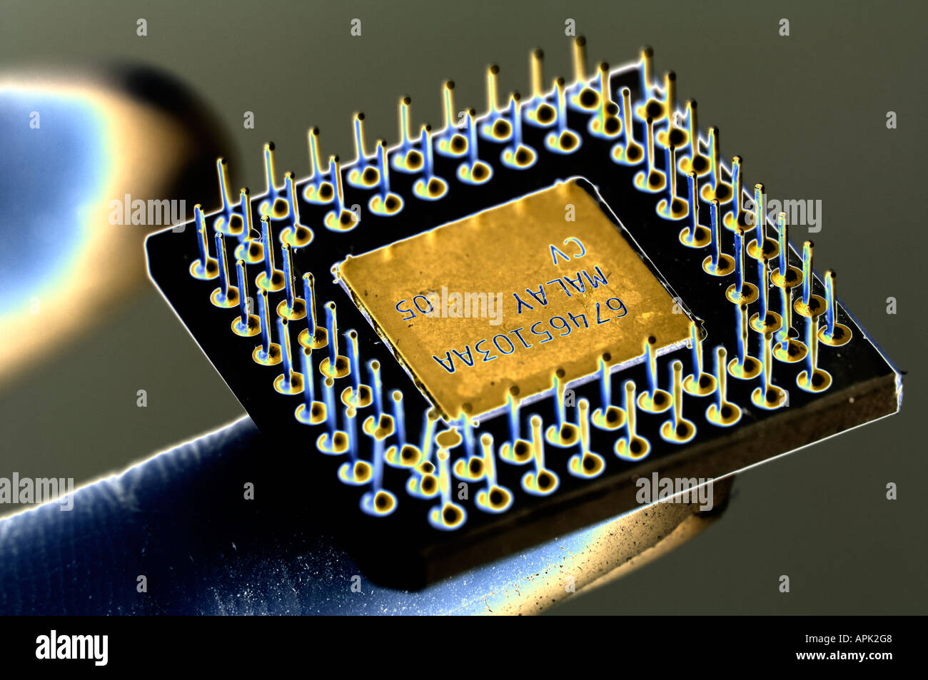 tiny computer processor chip balanced on tip of human finger Stock ...