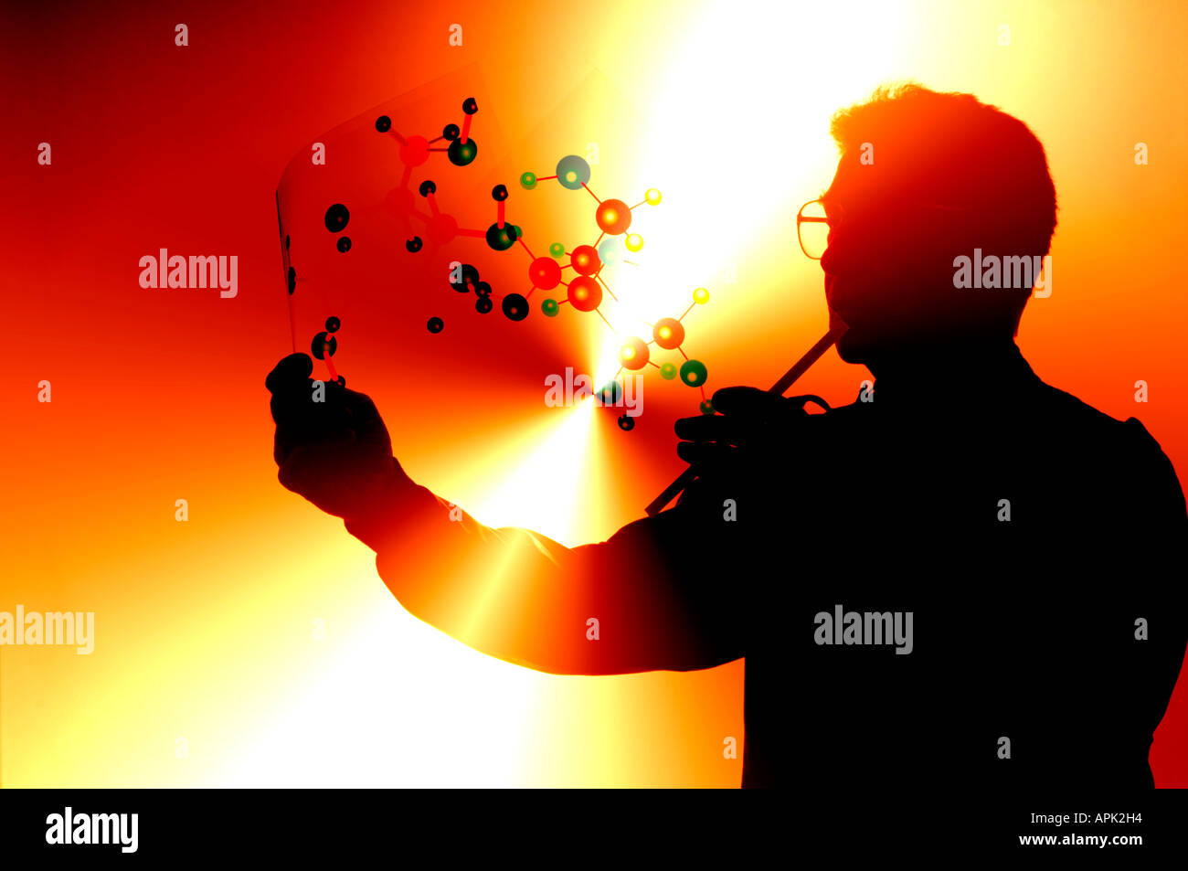 doctor comparing two medical color transparencies Stock Photo - Alamy