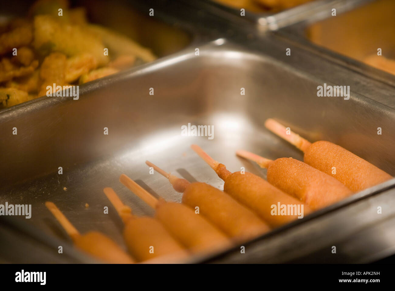 Deep fried food under a heat lamp Stock Photo - Alamy