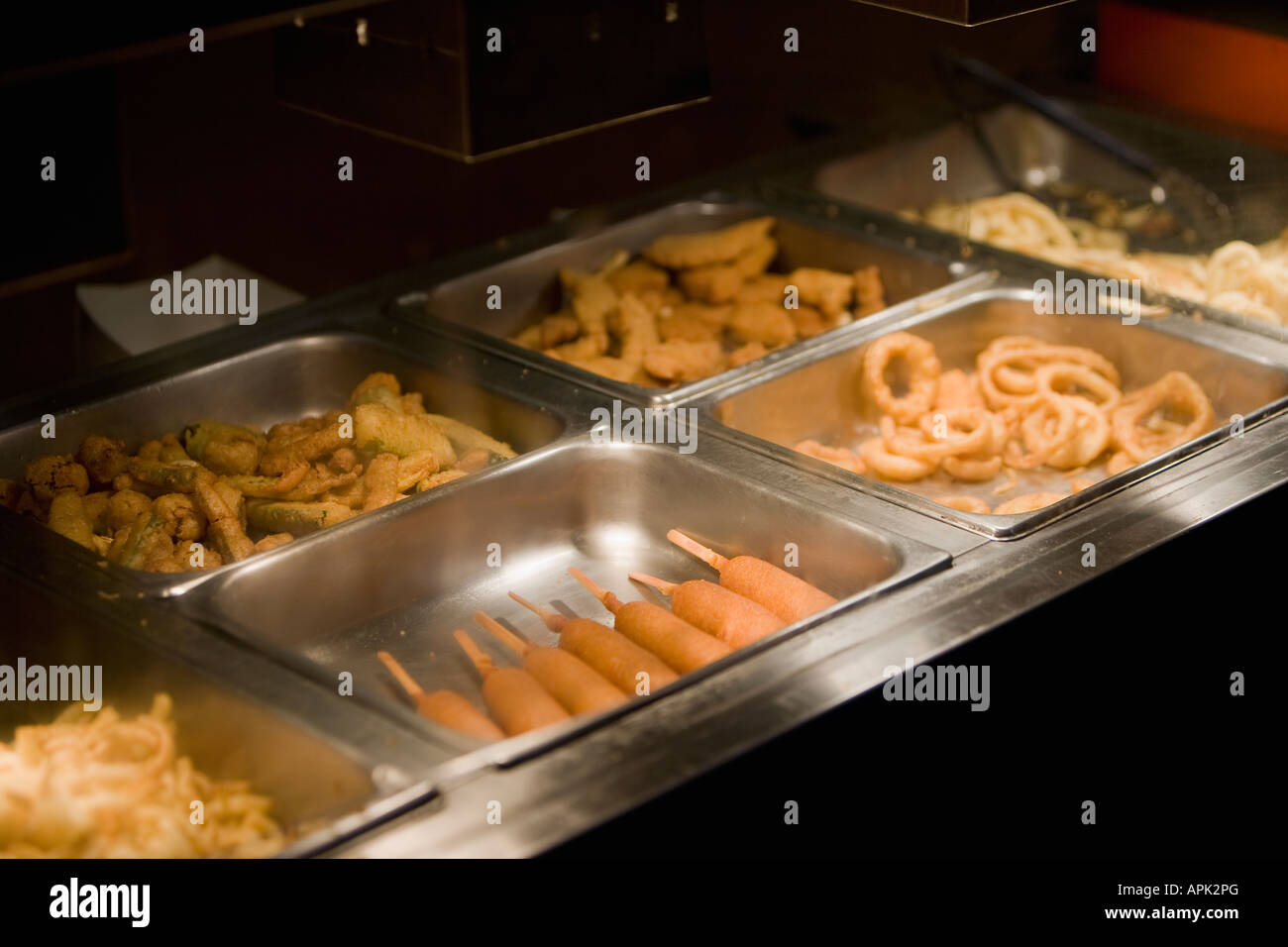 Deep fried food under a heat lamp Stock Photo - Alamy