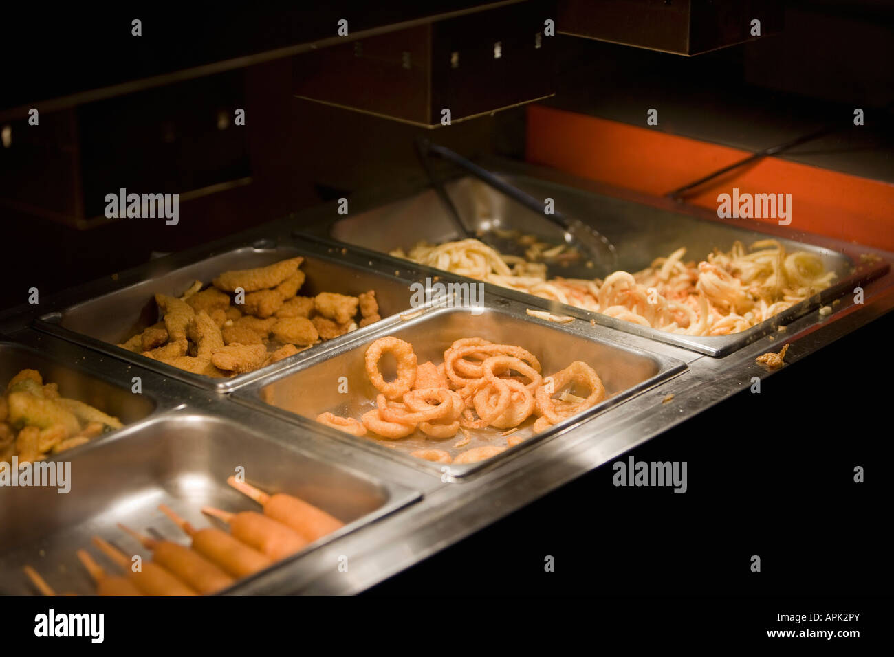 Deep fried food under a heat lamp Stock Photo - Alamy