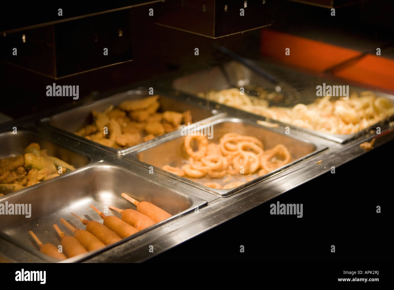 Deep fried food under a heat lamp Stock Photo - Alamy