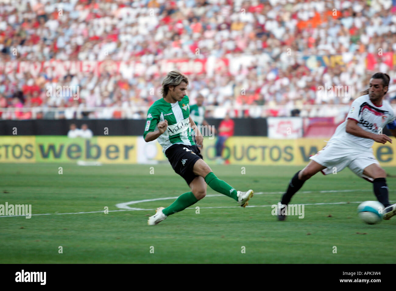 Football player scoring a goal hi-res stock photography and images - Alamy