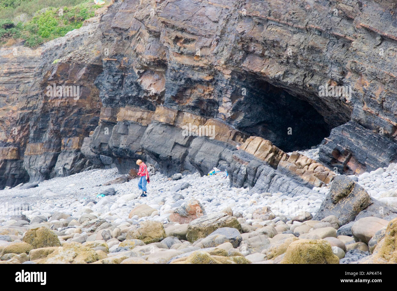Seam of coal exposed in the cliffs at Amroth in Pembrokeshire Stock ...