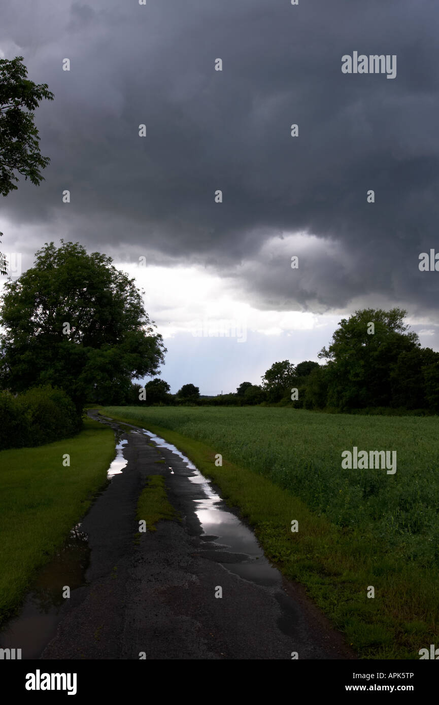 Dark wet rainy road Stock Photo - Alamy