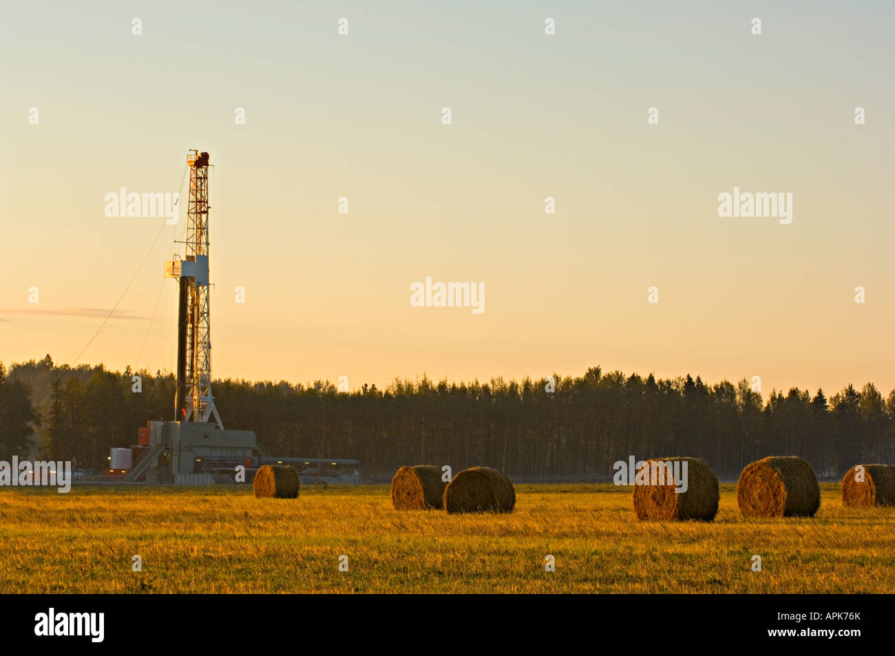 A drill rig exploring for underground minerals in a farm field Stock ...