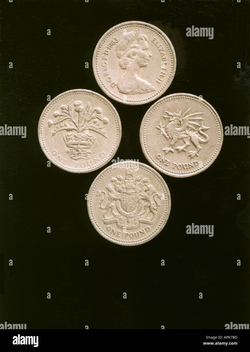 Four pound coins Stock Photo - Alamy