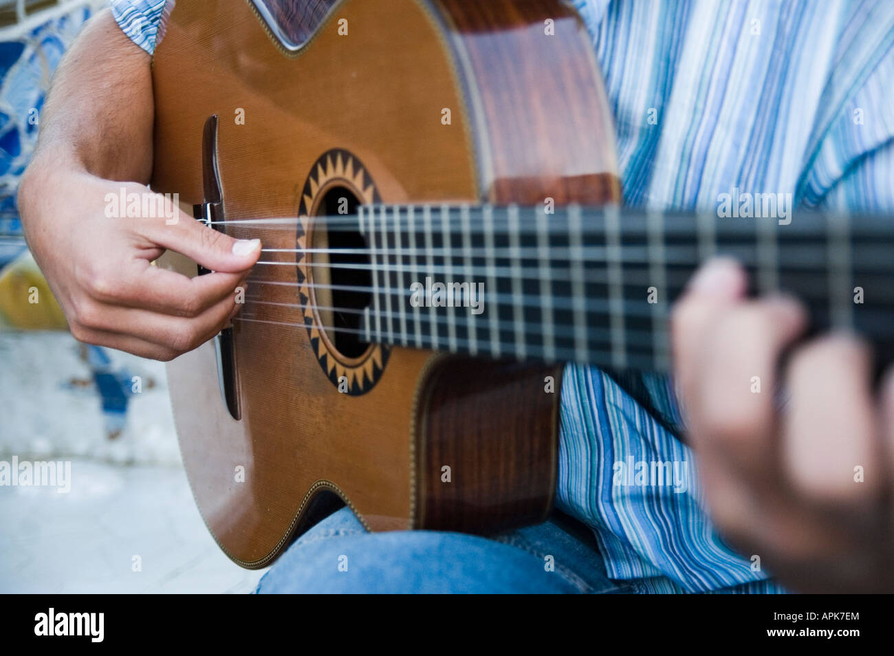 Musician playing guitar in the Güell park, Barcelona, Catalonia, Spain ...