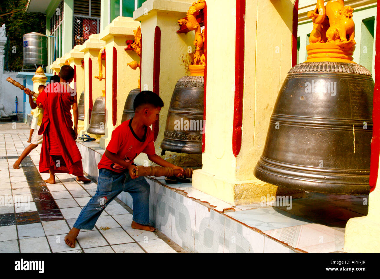 Children ringing bells hi-res stock photography and images - Alamy