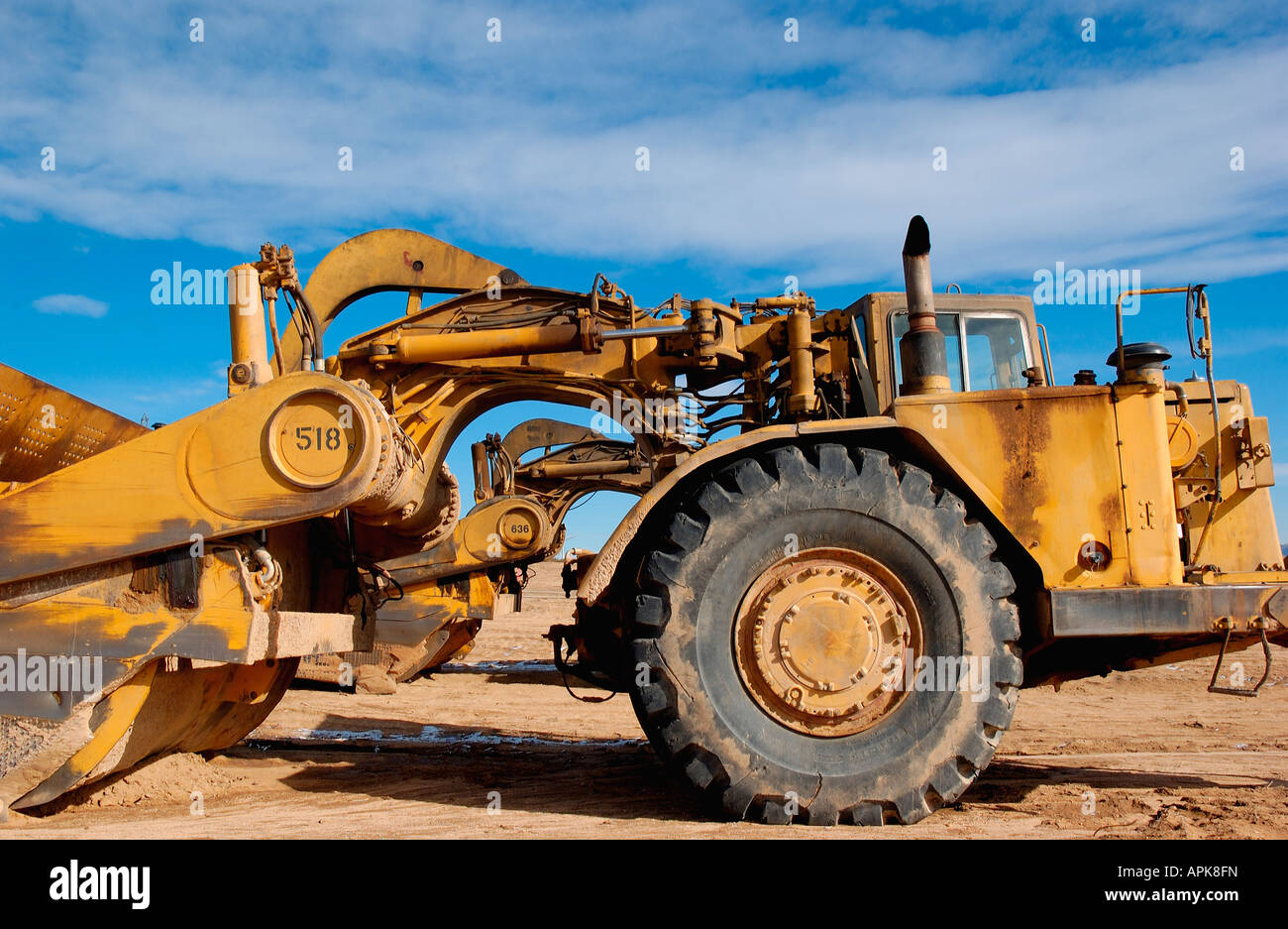 big yellow scraper Stock Photo - Alamy