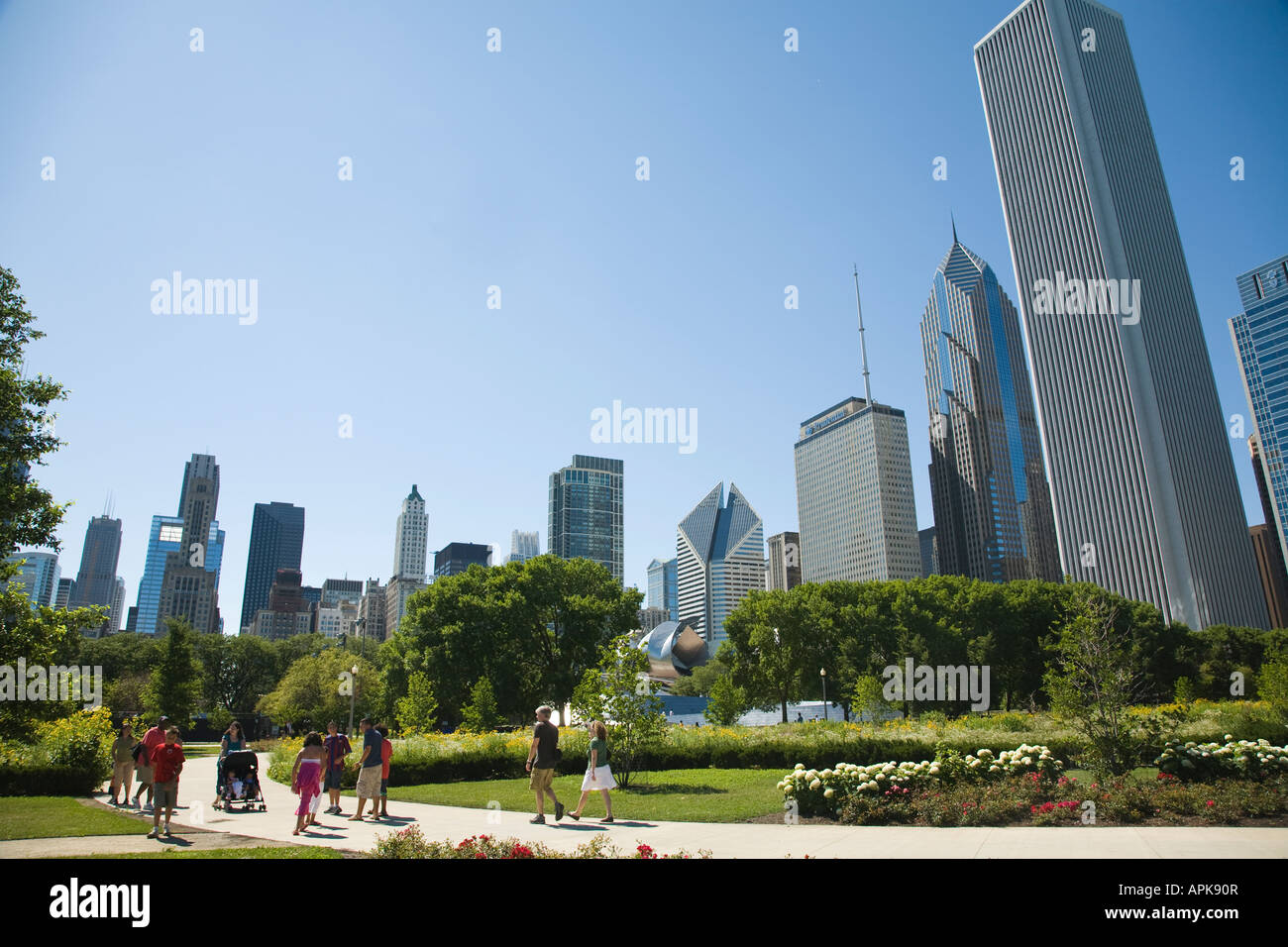 ILLINOIS Chicago People walking on sidewalk through open space and ...