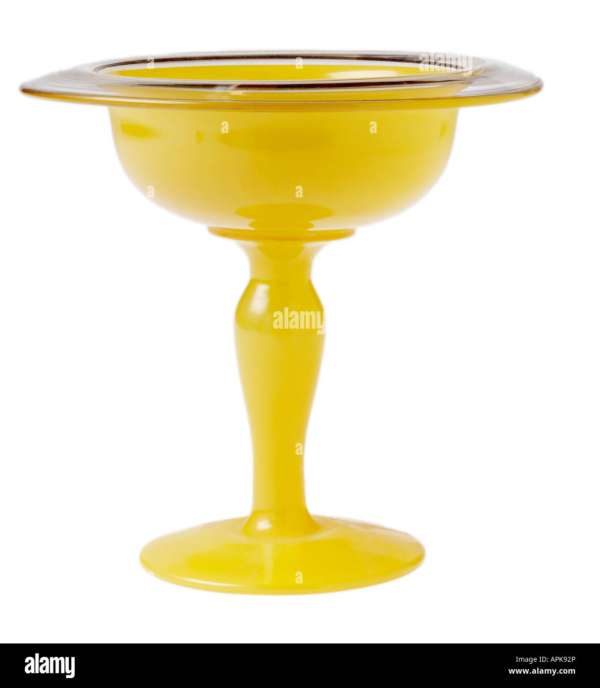 Antique yellow milk glass pedestal bowl Stock Photo - Alamy