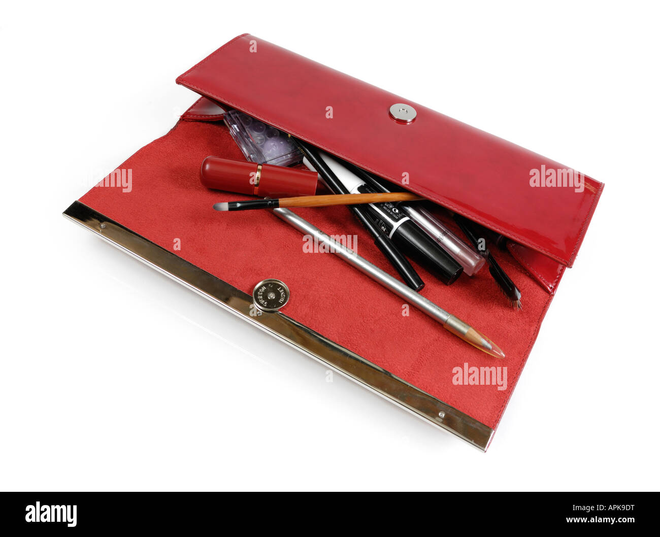 Open fancy red stylish handbag full of makeup accessories Stock Photo ...