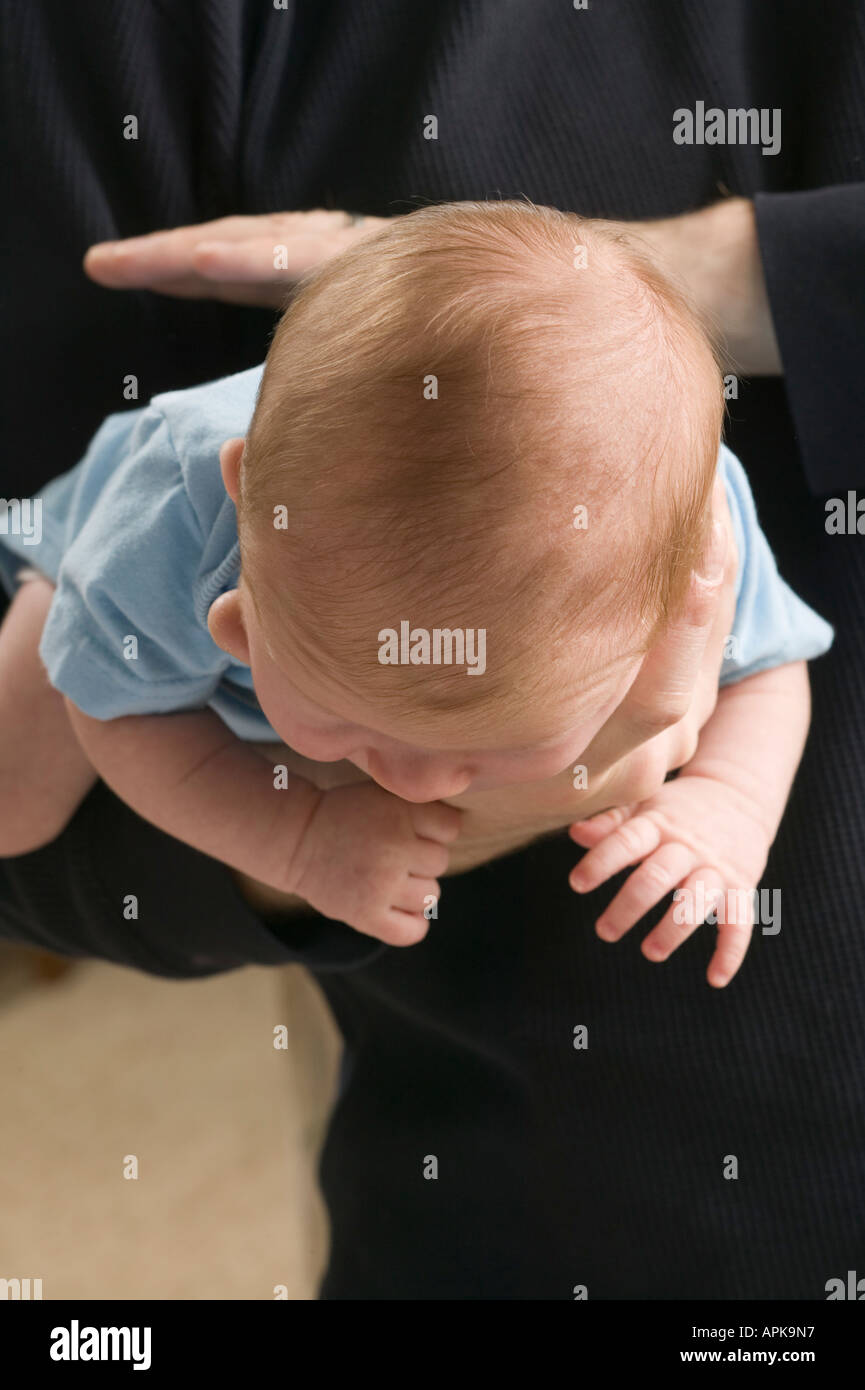 Burping baby hi-res stock photography and images - Alamy