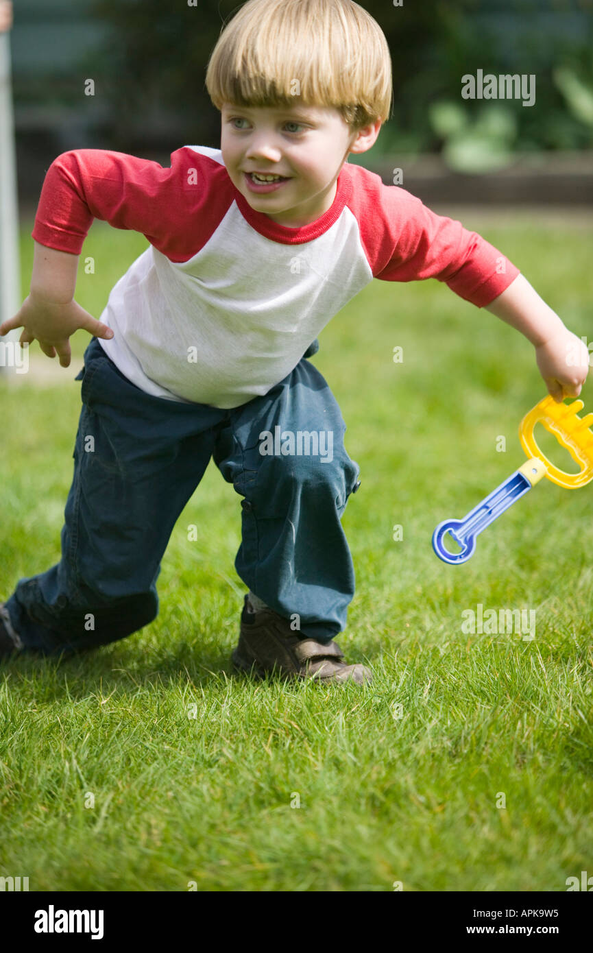 Young Boy Playing Stock Photo - Alamy