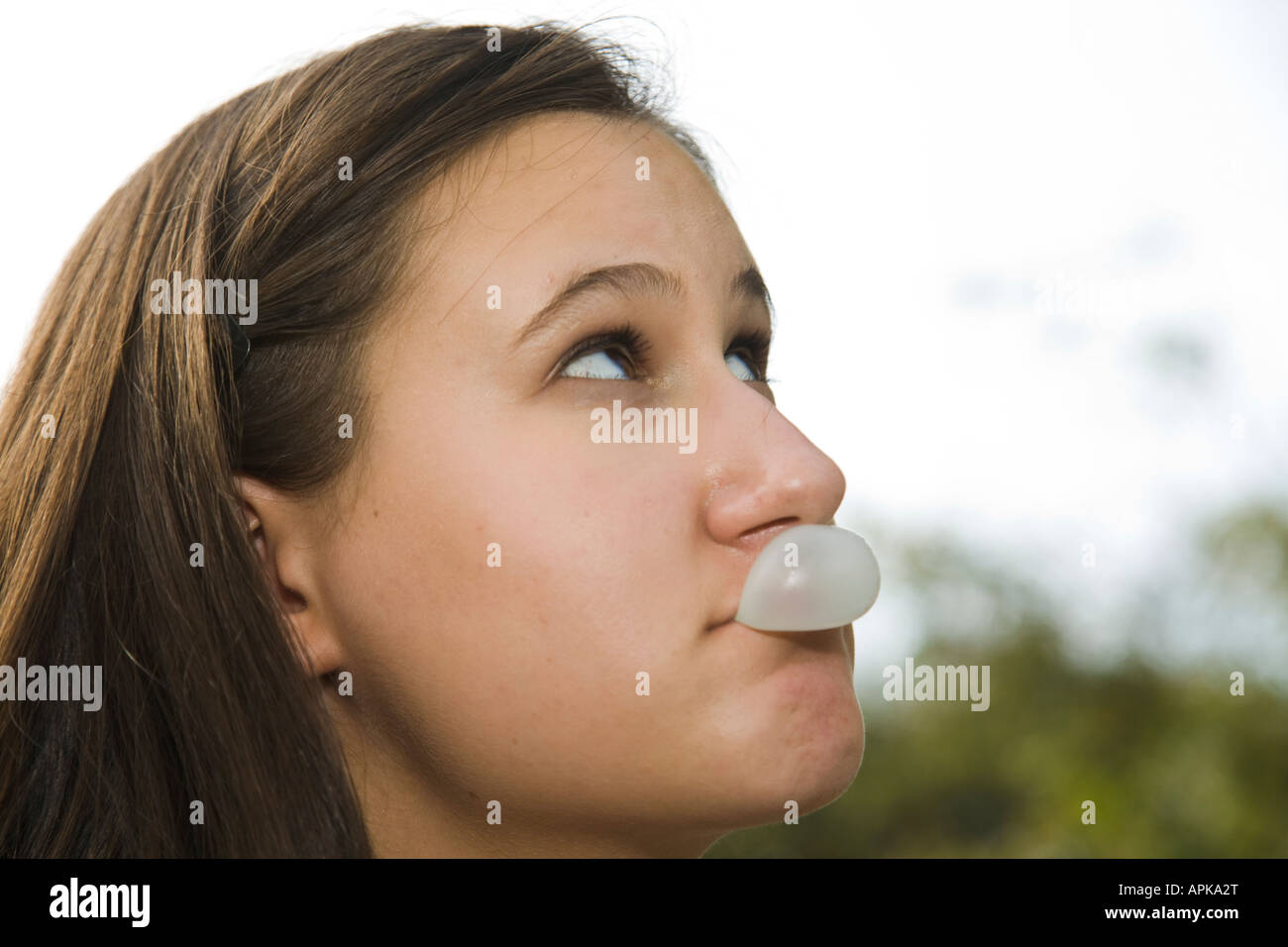 Teenager chewing bubble gum hi-res stock photography and images - Alamy