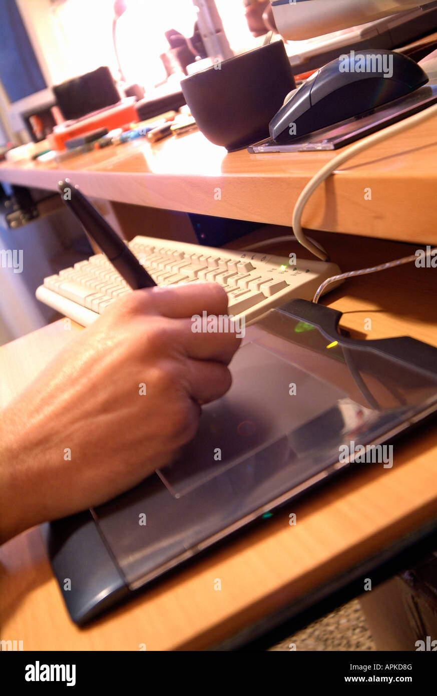 Working on a computer with a graphical pen tablet Stock Photo - Alamy