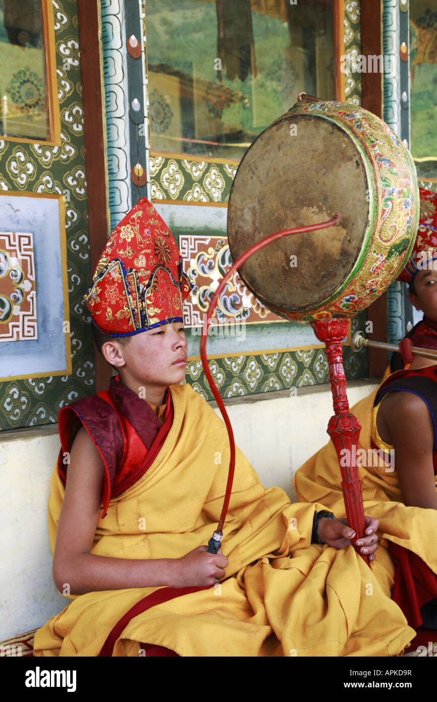 Tsechu-festival in the monastery Tamshimg, lama with ritual drum ...
