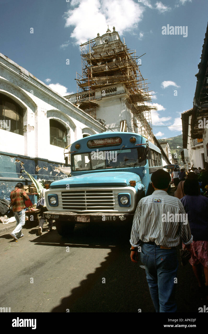 Ecuador Quito transport bus passing through market Stock Photo - Alamy