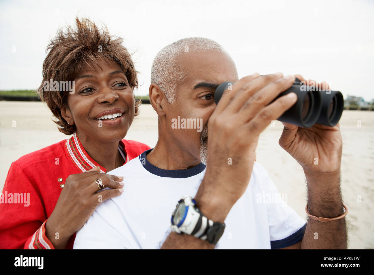 Couple using binoculars hi-res stock photography and images - Alamy