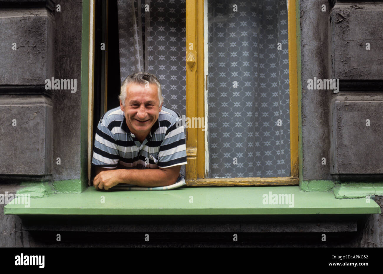 Katowice 1980 Poland pollution factory plant smoke Man Window Stock ...