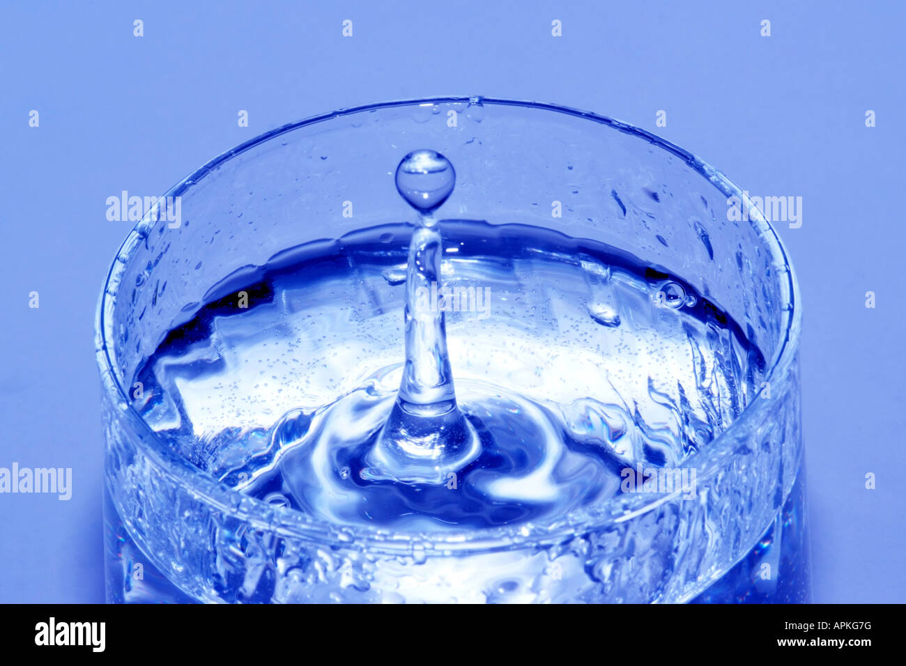 water dripping in a water glass Stock Photo - Alamy