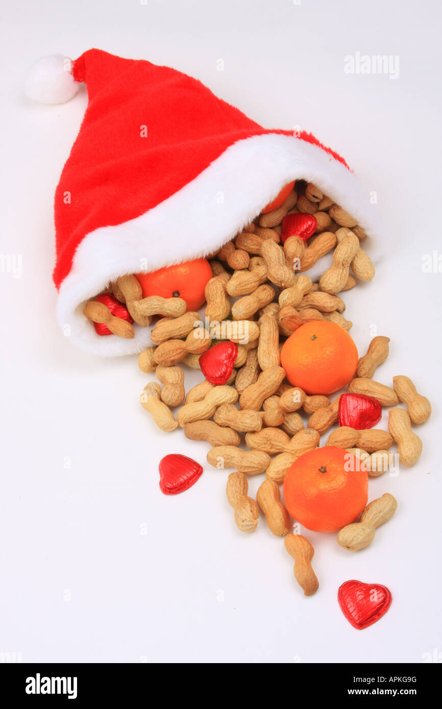 Santa claus cap with tangerines hi-res stock photography and images - Alamy