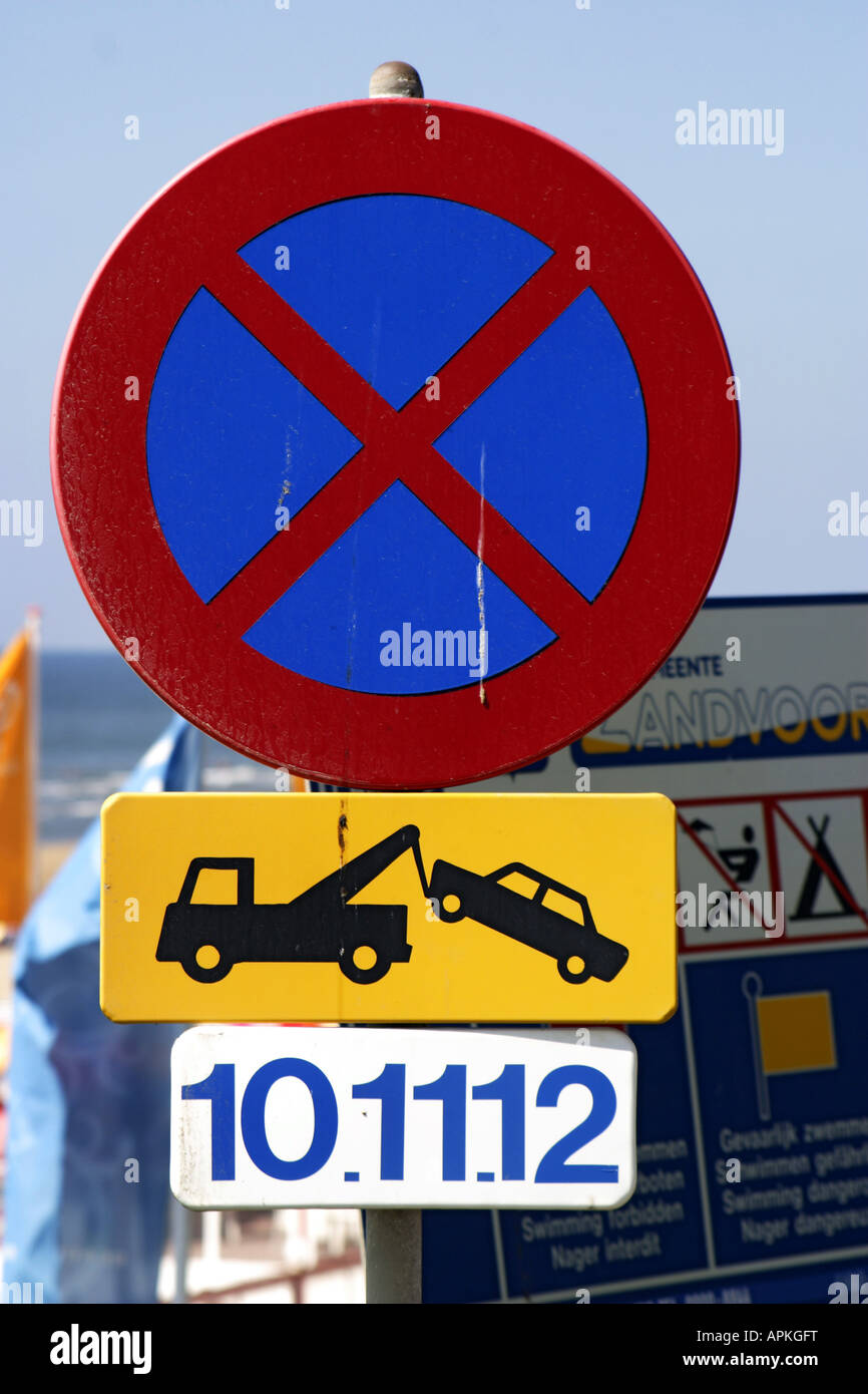 traffic sign and warning against towing at the beach promenade in ...