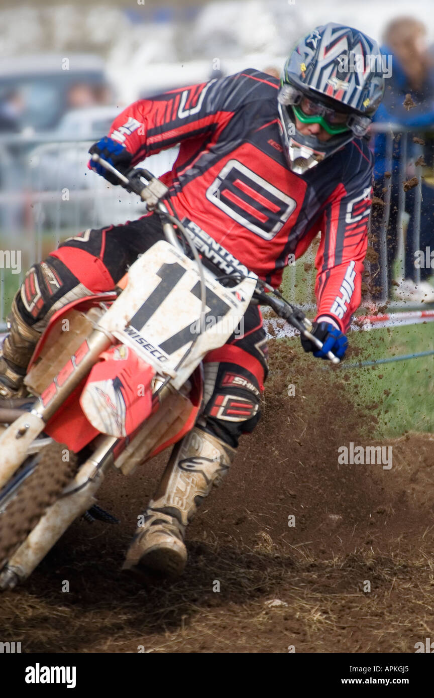 Motocross rider taking a corner Stock Photo - Alamy