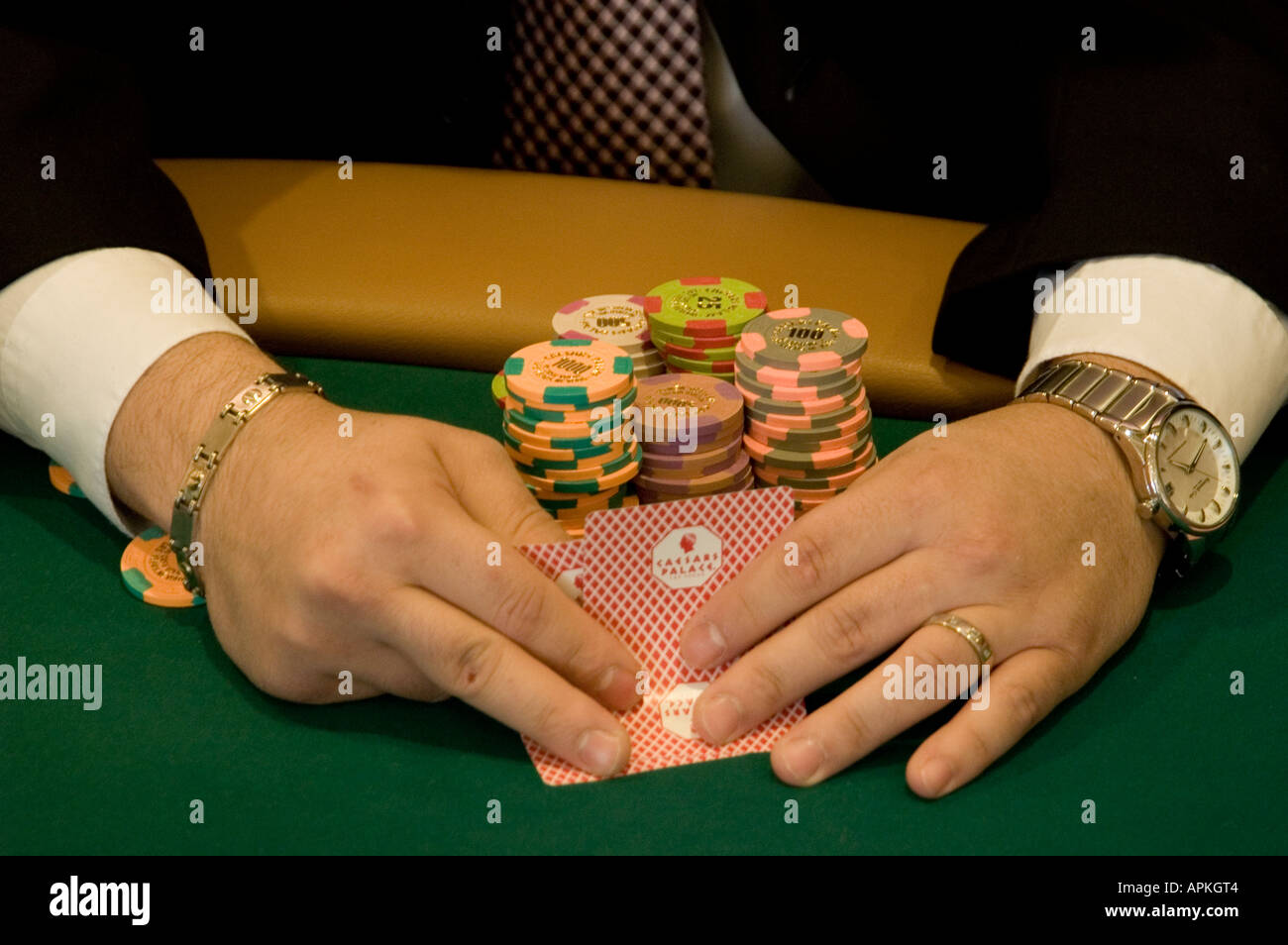 Hands and cards of poker hand at Nevada Caesars Palace and Casino Stock ...