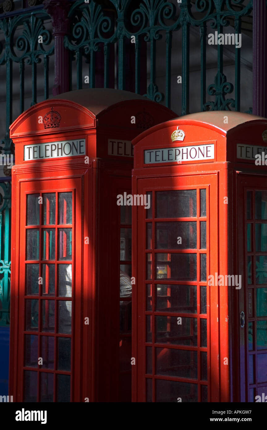 Classic British red public phone boxes, in Smithfield Market, City of ...