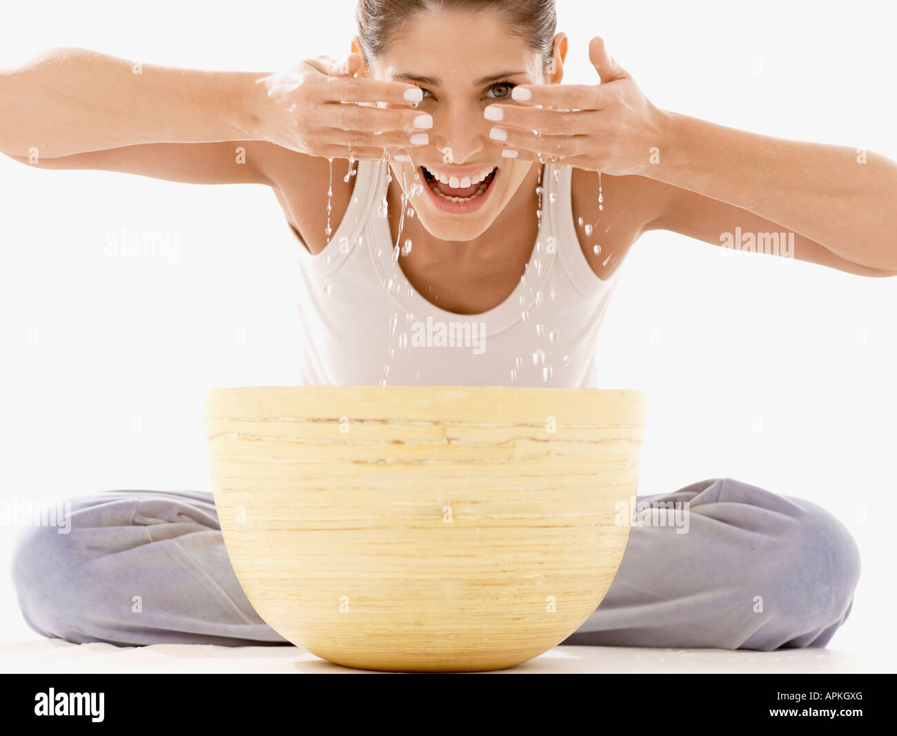 Woman washing face Stock Photo - Alamy