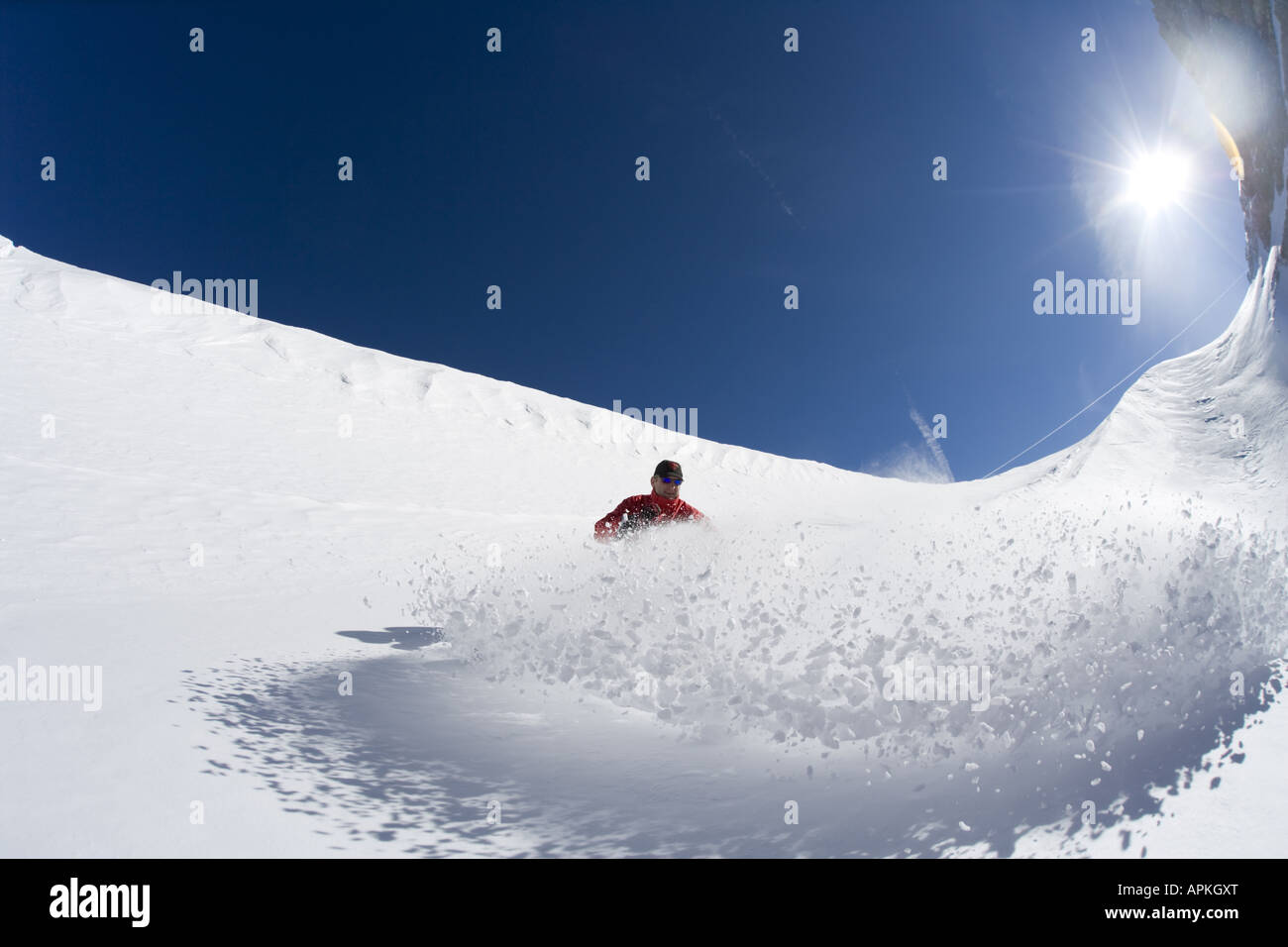 snowboarder on the run in deep powder snow, Austria Stock Photo - Alamy