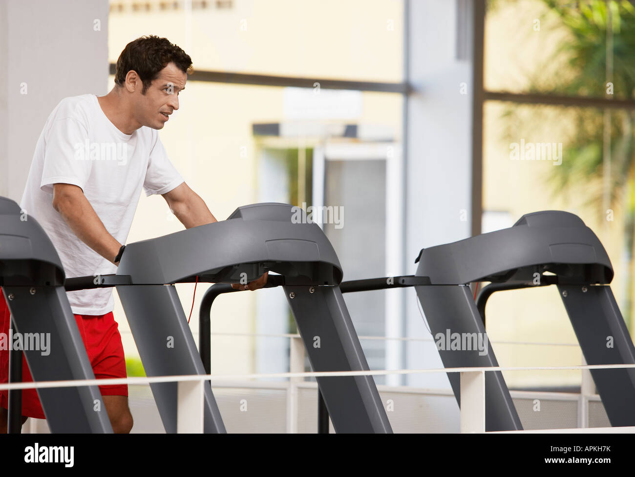 Man on treadmill Stock Photo - Alamy
