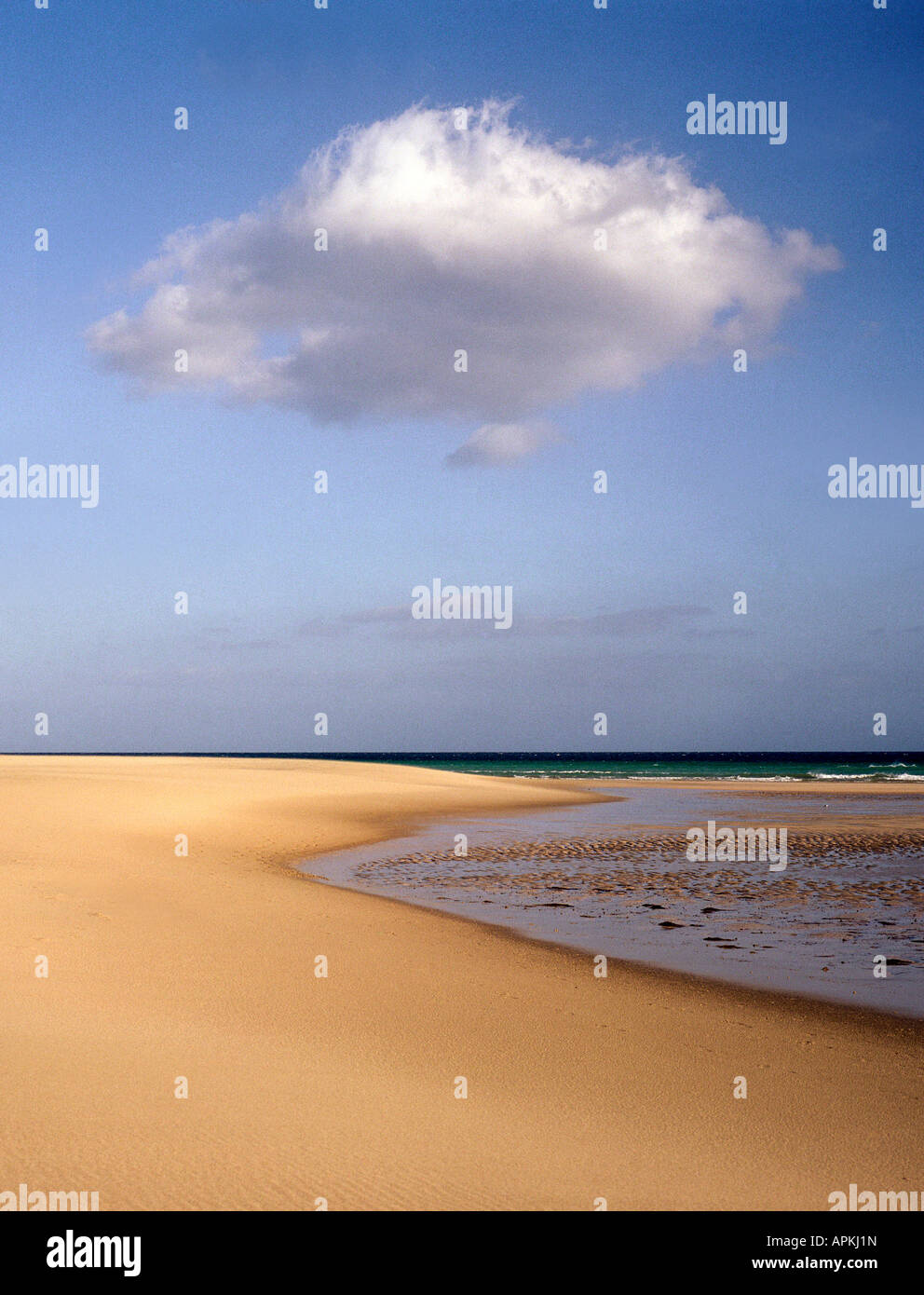 Cloud over beach Stock Photo - Alamy