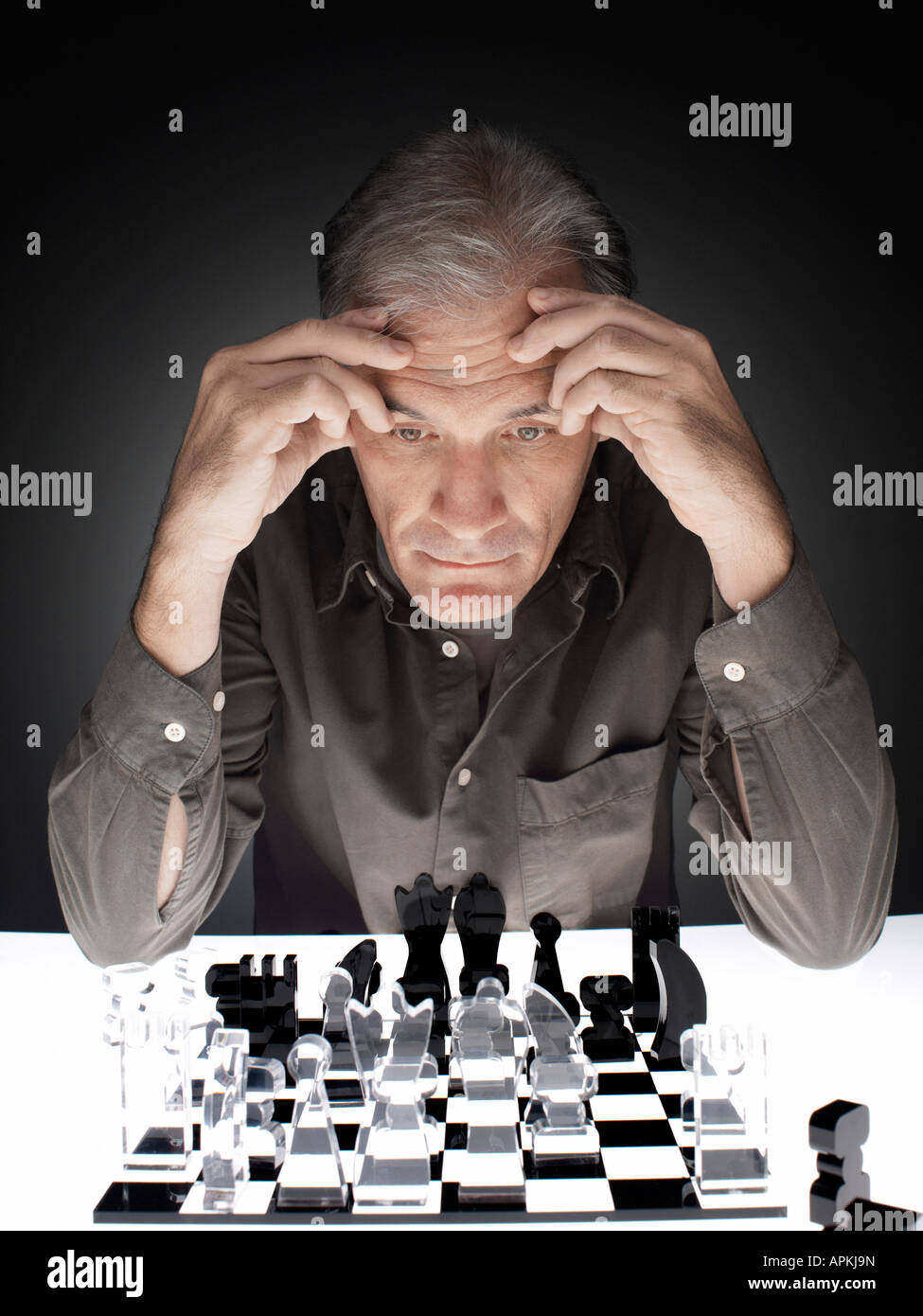 Man playing chess Stock Photo - Alamy
