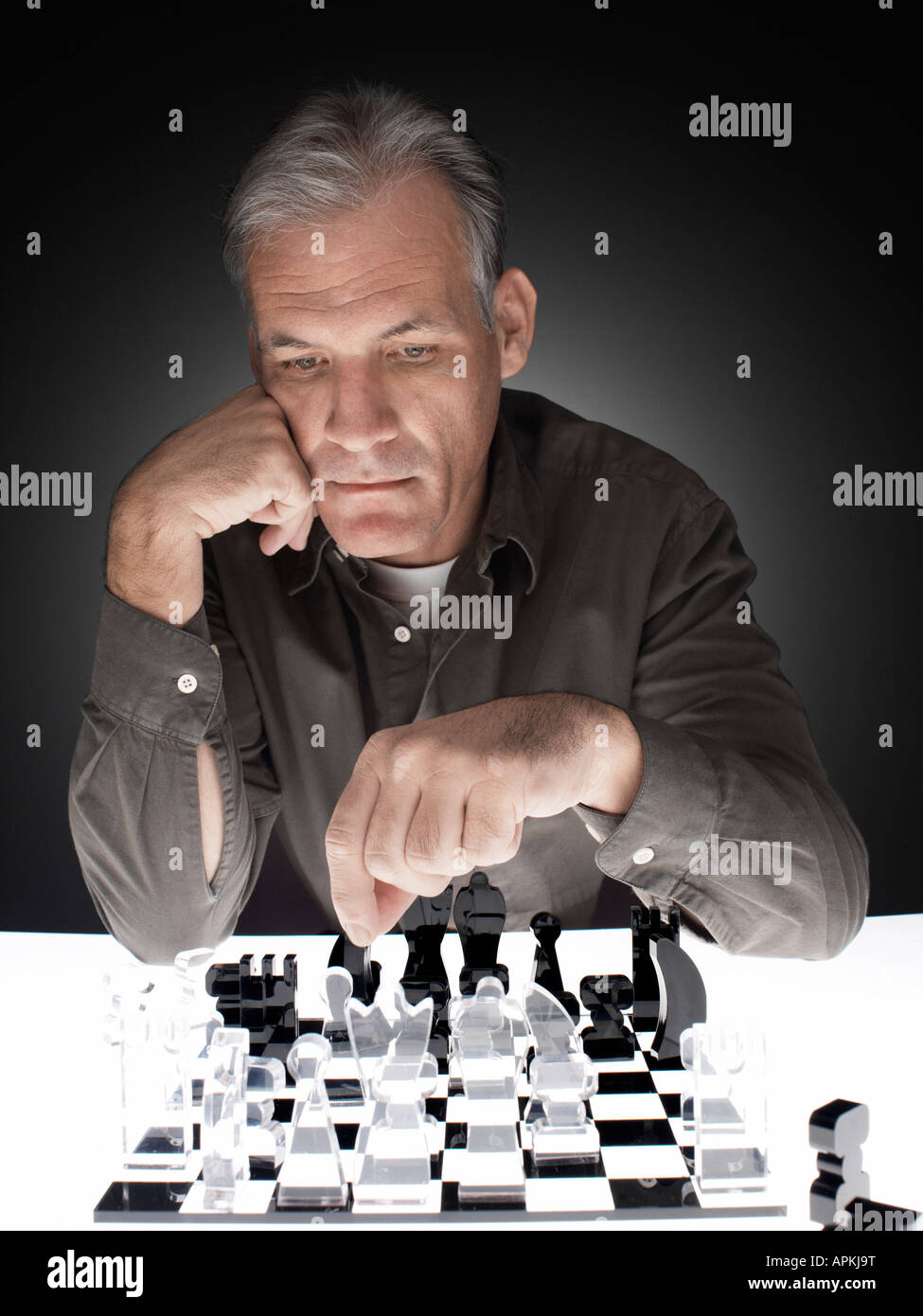 Man playing chess Stock Photo - Alamy