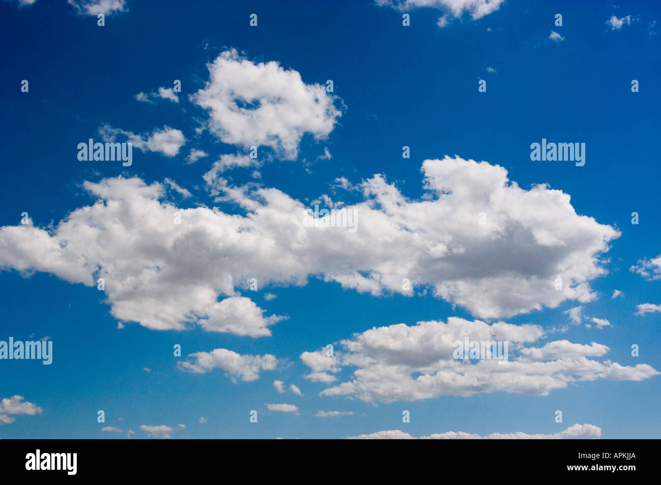 Blue Sky Fluffy white Clouds over Grand Canyon Arizona AZ Stock Photo ...