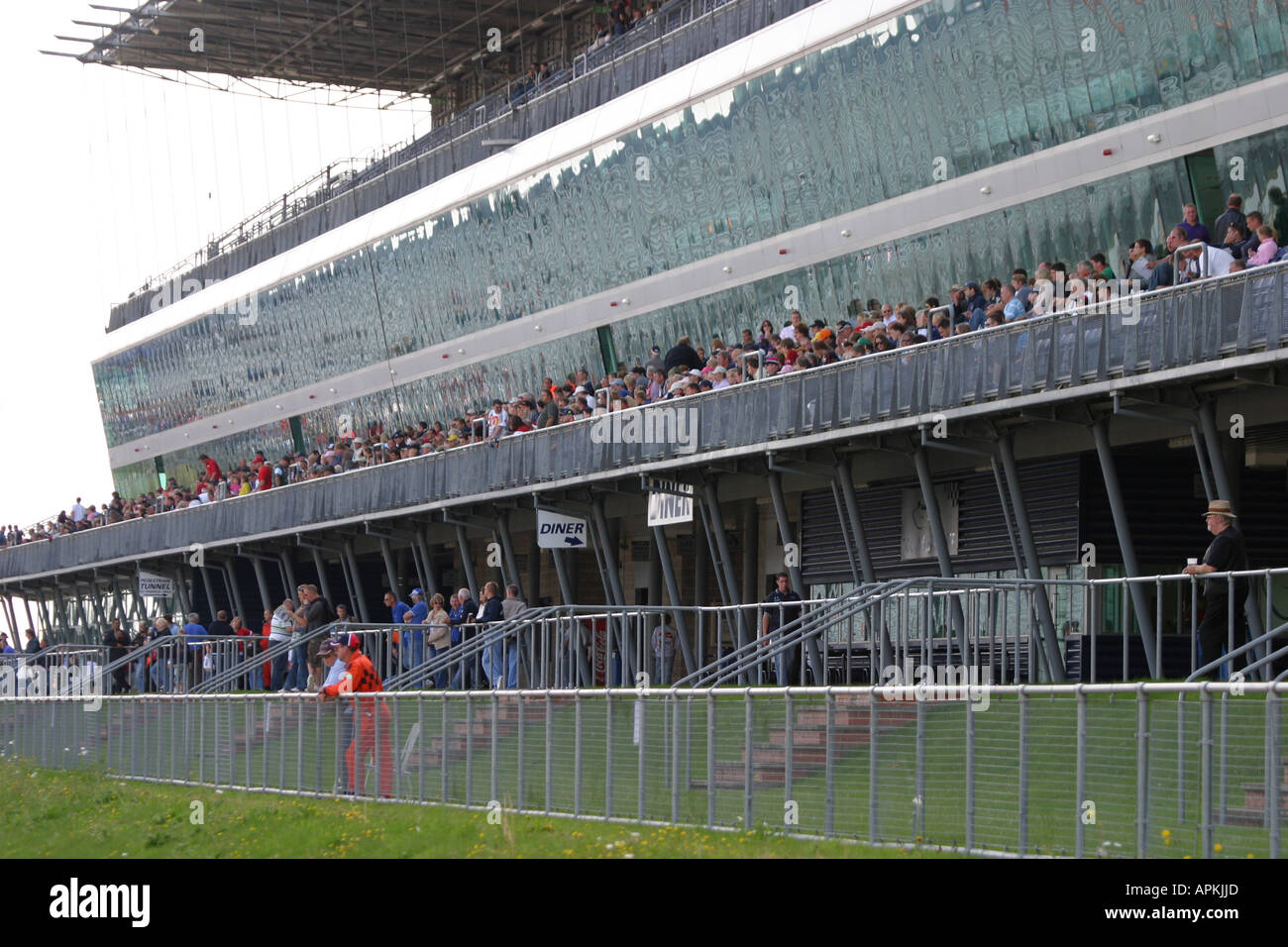 Spectators in the grandstand at a motor sport meeting Stock Photo - Alamy