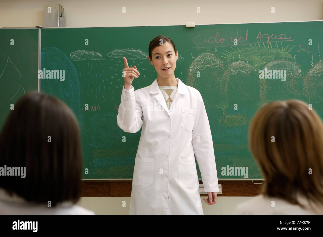 Students and teacher in classroom Stock Photo - Alamy