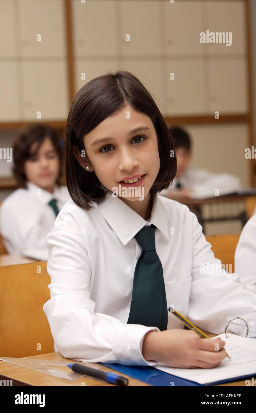 Child working alone at desk in class classroom hi-res stock photography and images - Alamy