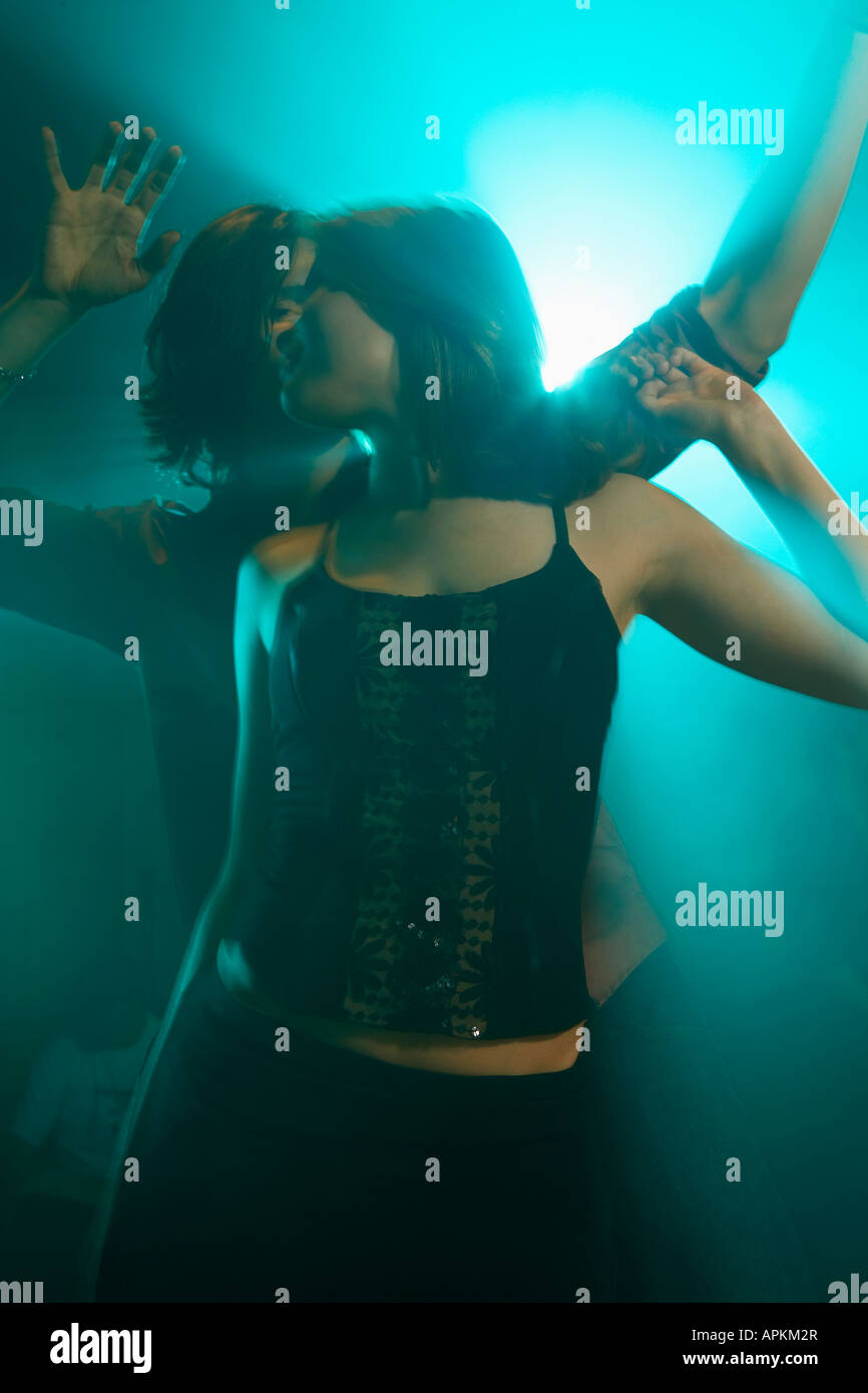 Two young people clubbing (back lighting Stock Photo - Alamy