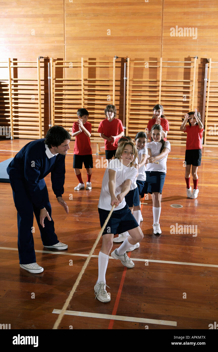 Students and teacher in school gym Stock Photo - Alamy