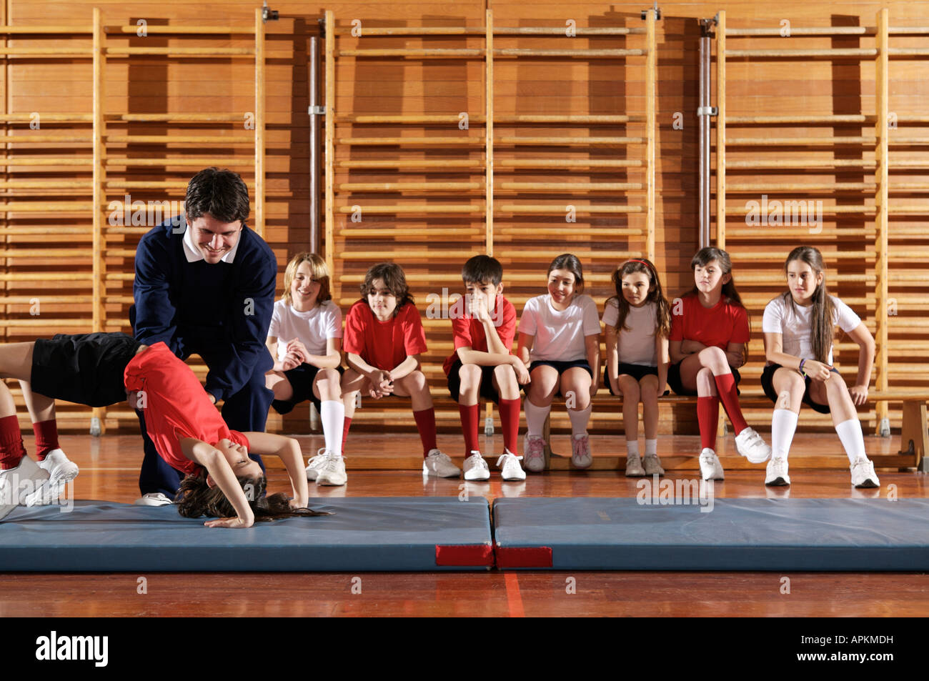 School instruction in gymnastics hi-res stock photography and images ...
