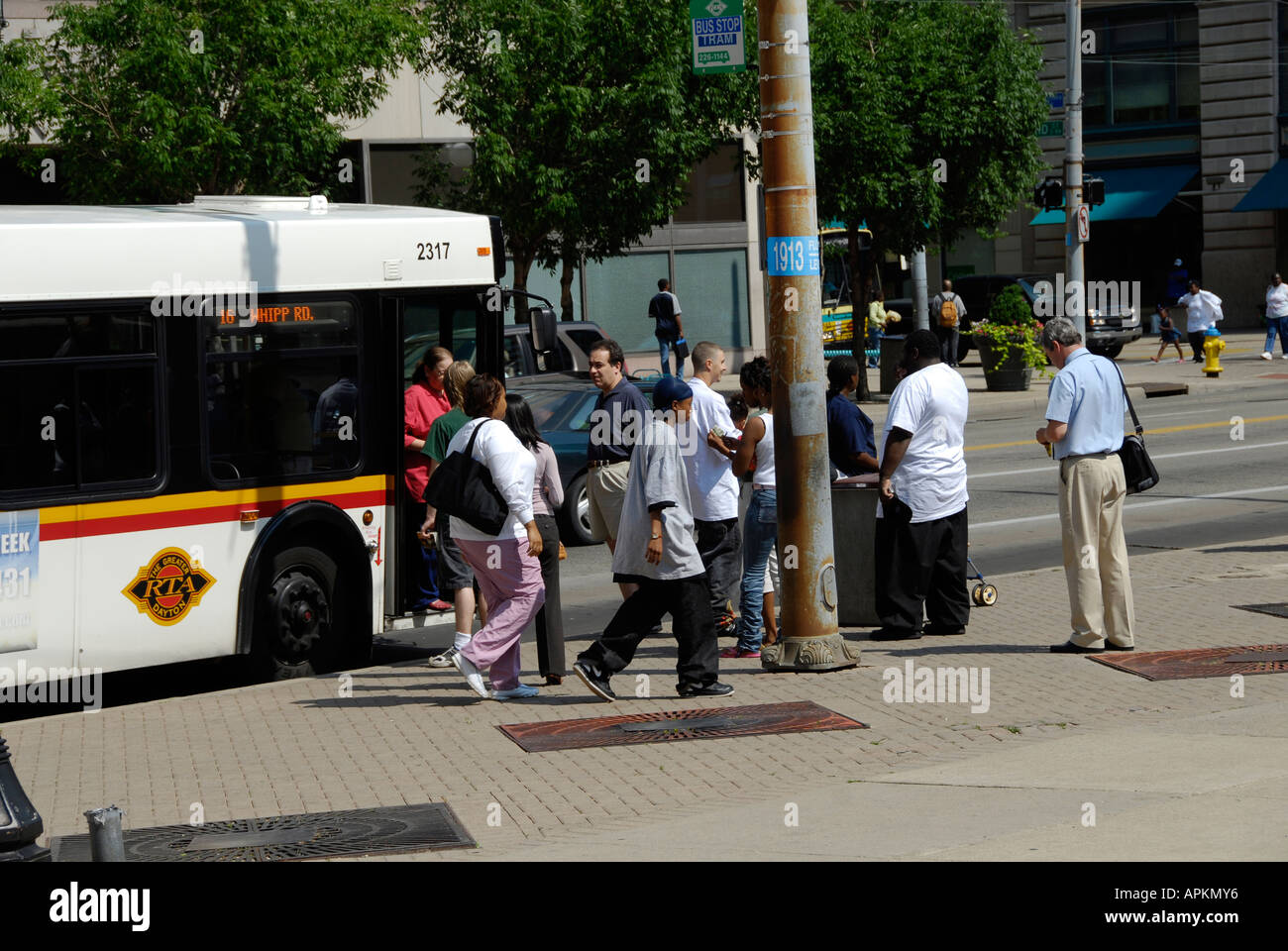 Citizens use public bus transportation in the city of Dayton Ohio OH ...